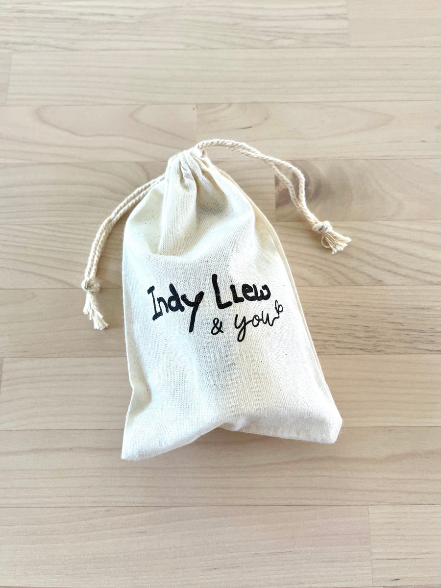 Indy Llew Candle + drawstring bag with signature – Indy Llew and You